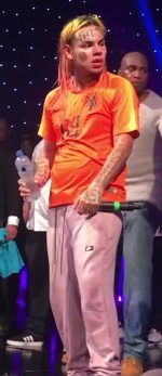 6ix9ine's Net Worth, Early Life, Career, Prison Time, and More