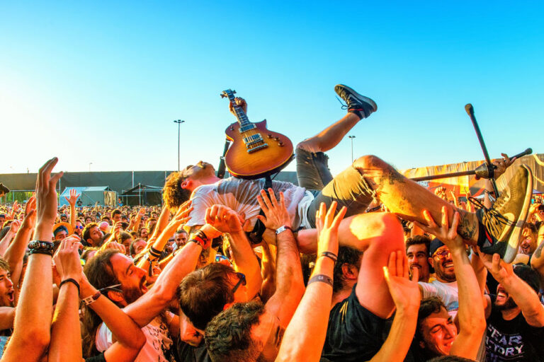 Crowd Surfing: The Joys and Dangers of a Decades-Long Concert Tradition