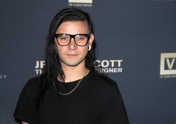 15 Singers Who Were Adopted: John Lennon, Faith Hill, and More